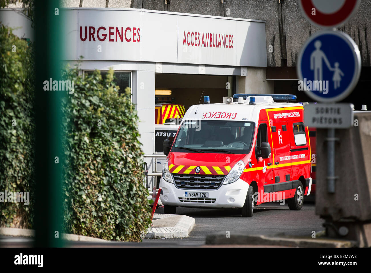 Paris, France. 10th Oct, 2014. An ambulance passes by the entrance of ...