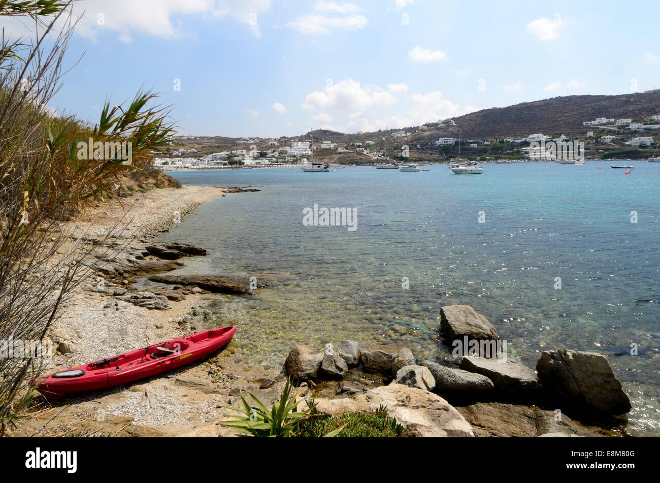 Canoe on beach, Ornos Bay, Mykonos, Greece Stock Photo - Alamy