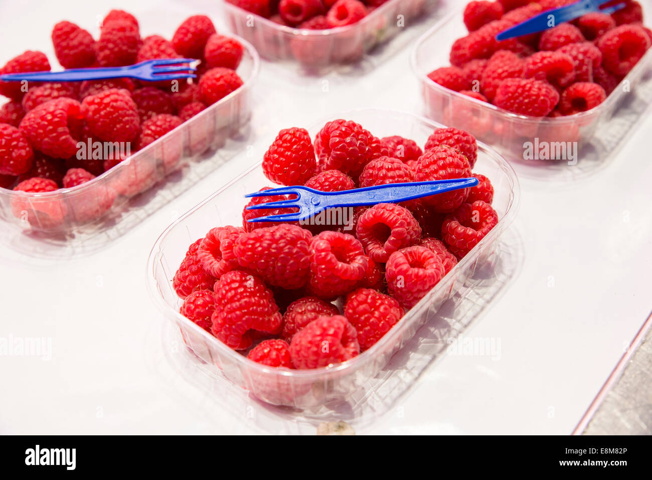 colored red raspberries ready to eat Stock Photo - Alamy