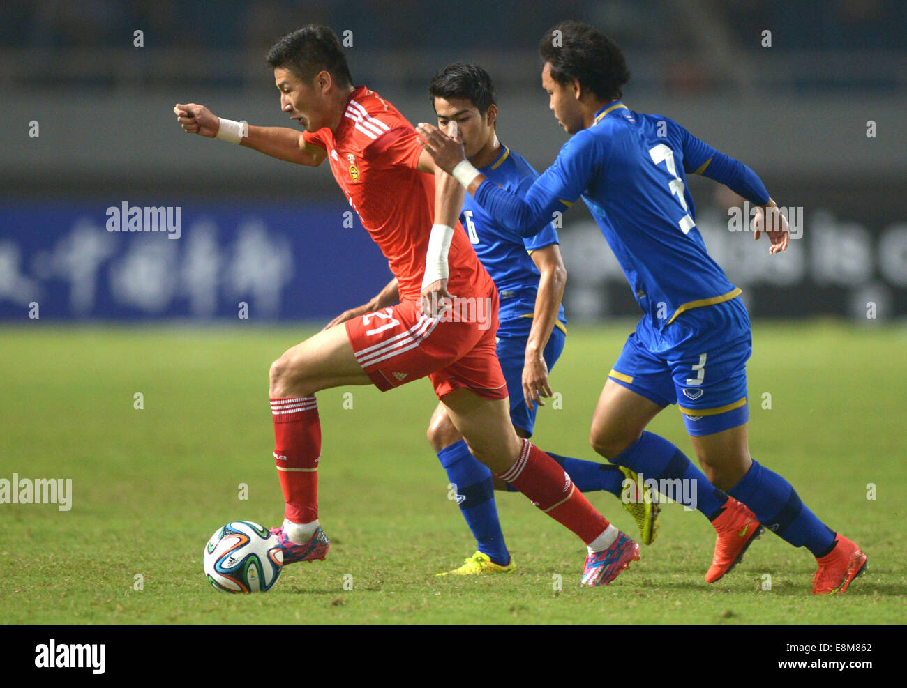 Shanghai, China's Hubei Province. 10th Oct, 2014. China's Yu Hai (L ...