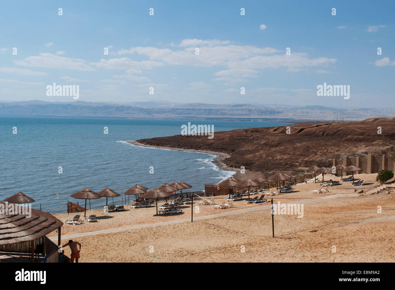 Jordan: rocky landscape and a beach at the Dead Sea, or Salt Sea, the ...
