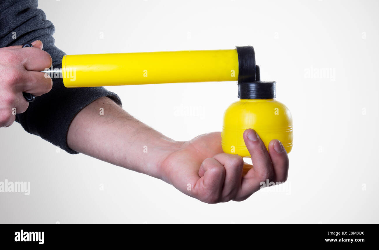 Man holding small hand hold pesticide sprayer safely Stock Photo - Alamy