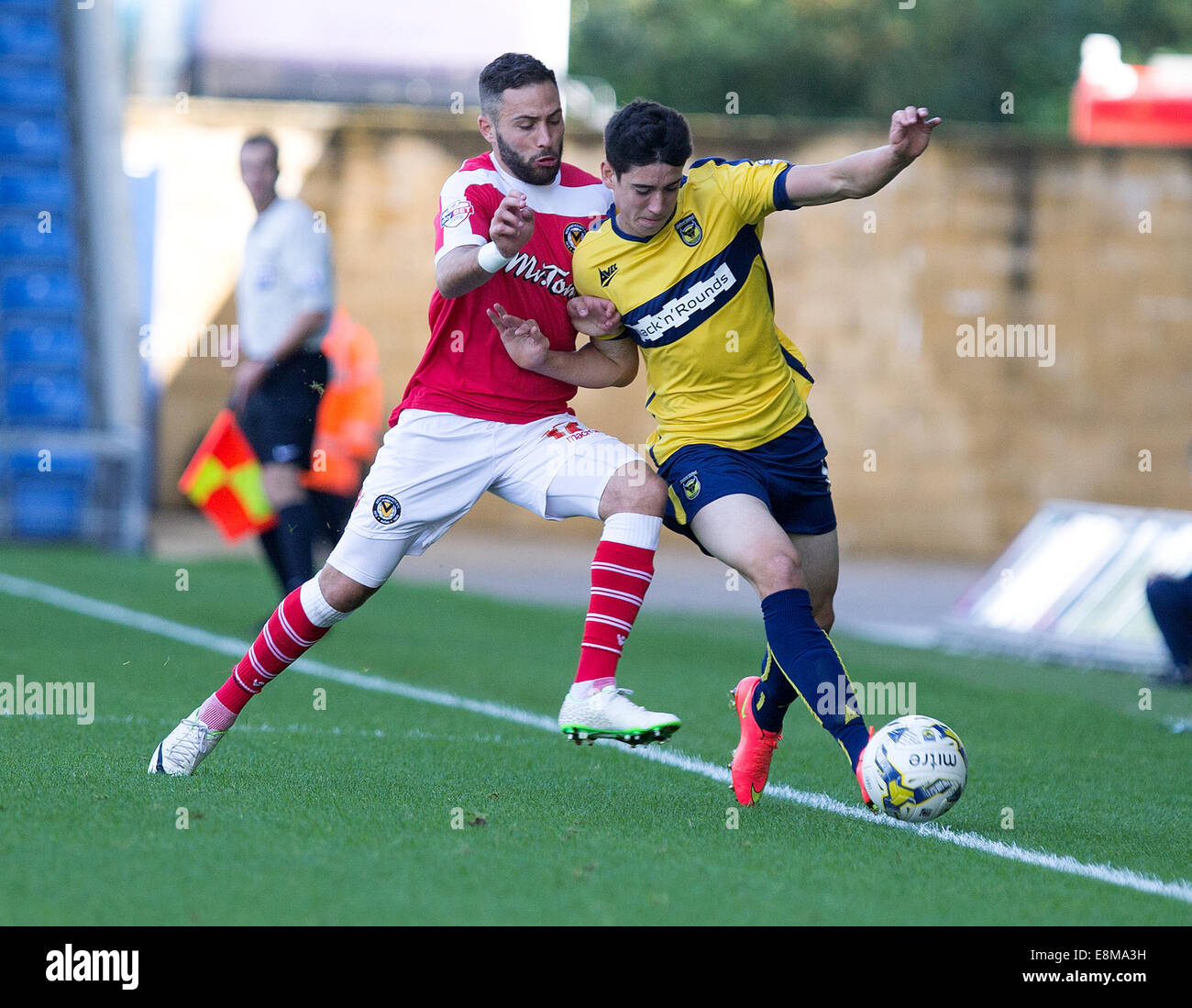 04/10/2014 FOOTBALL: Oxford United v Newport A robust challenge from ...