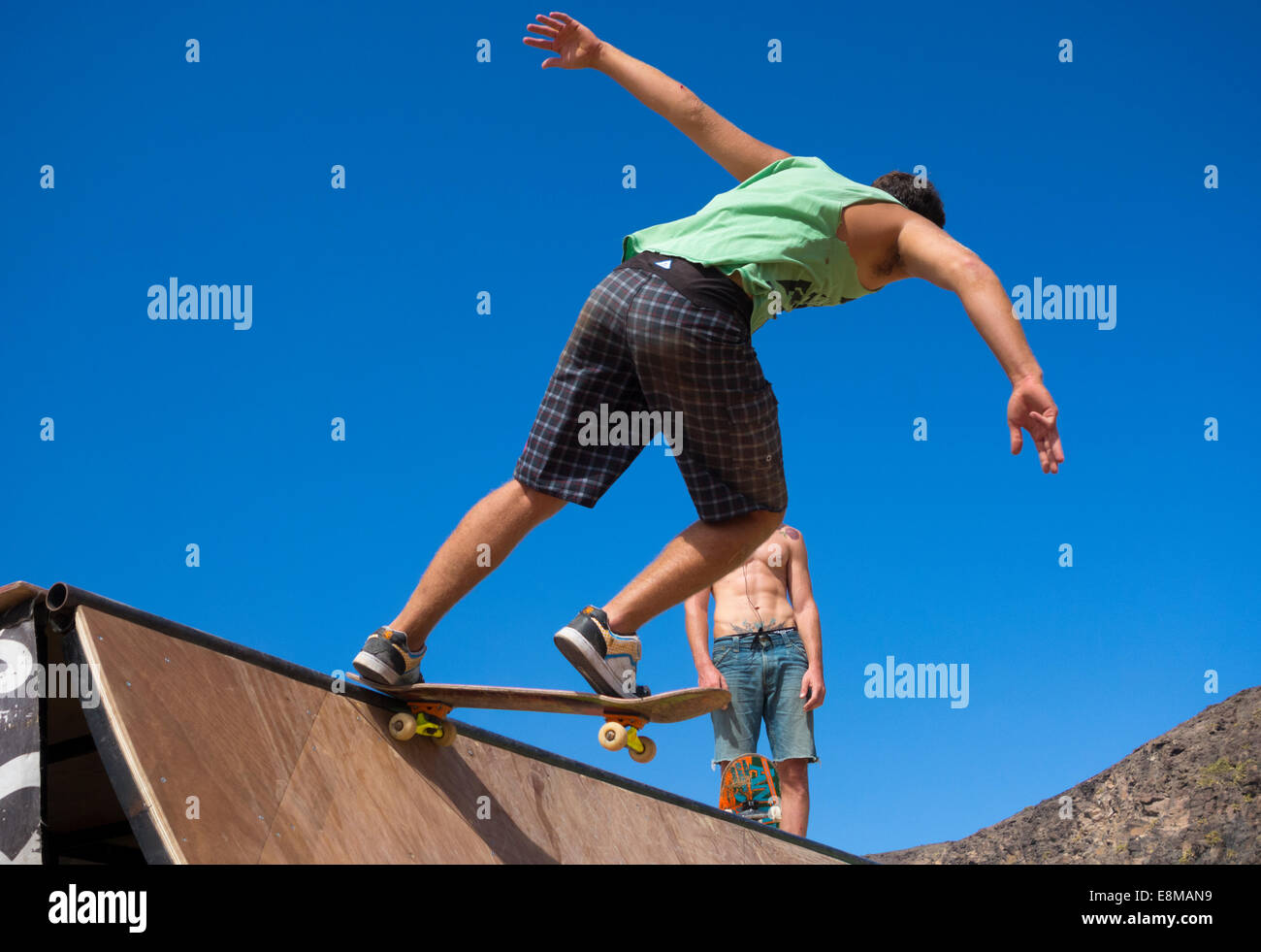 Skateboarder on Skateboarding ramp in skatepark Stock Photo - Alamy