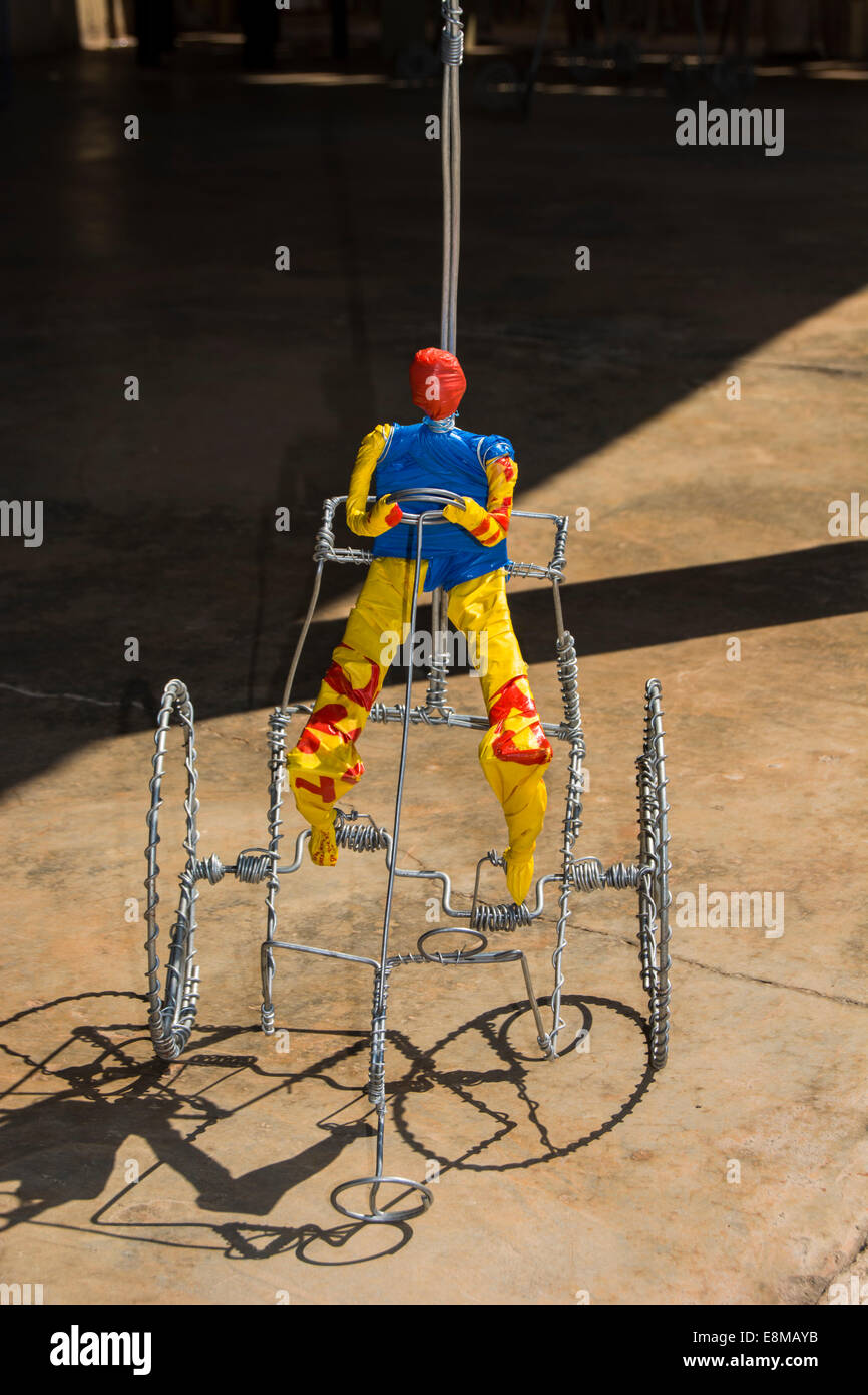 A handmade wire man driving Stock Photo - Alamy