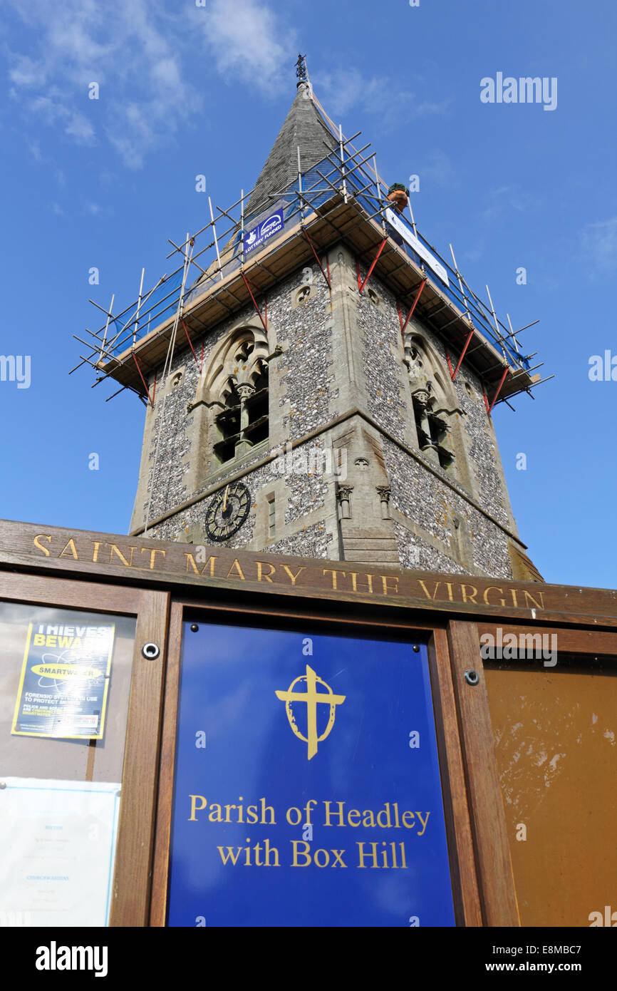 Headley, Surrey, UK. 10th October 2014. Workers repair the historic ...