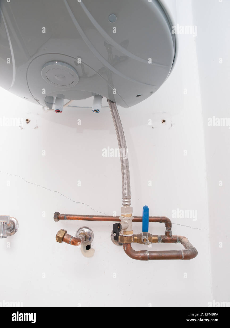 Electric water heater inside a house detail Stock Photo - Alamy