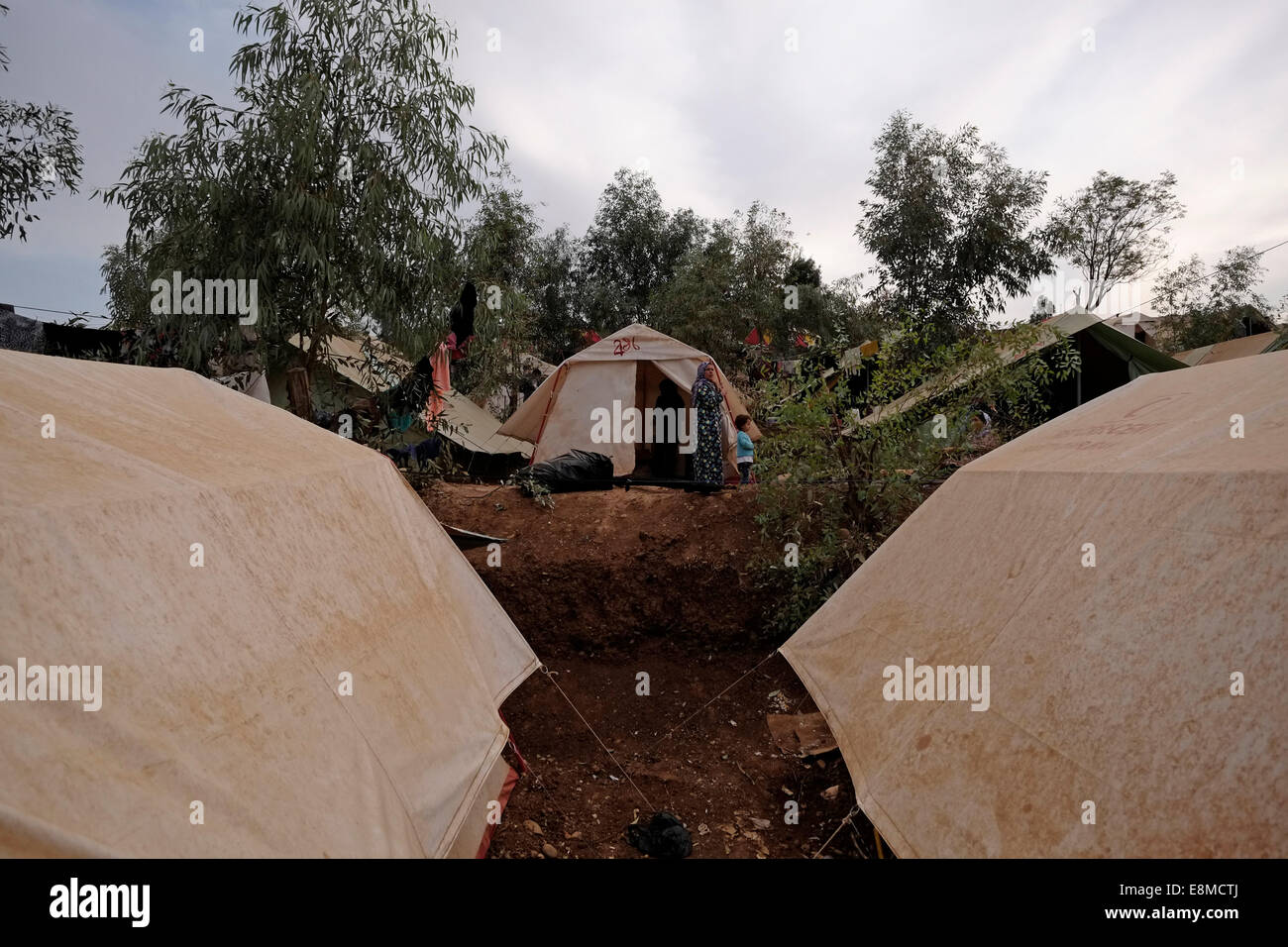 Temporary shelter tents at a refugee camp for displaced people from the ...