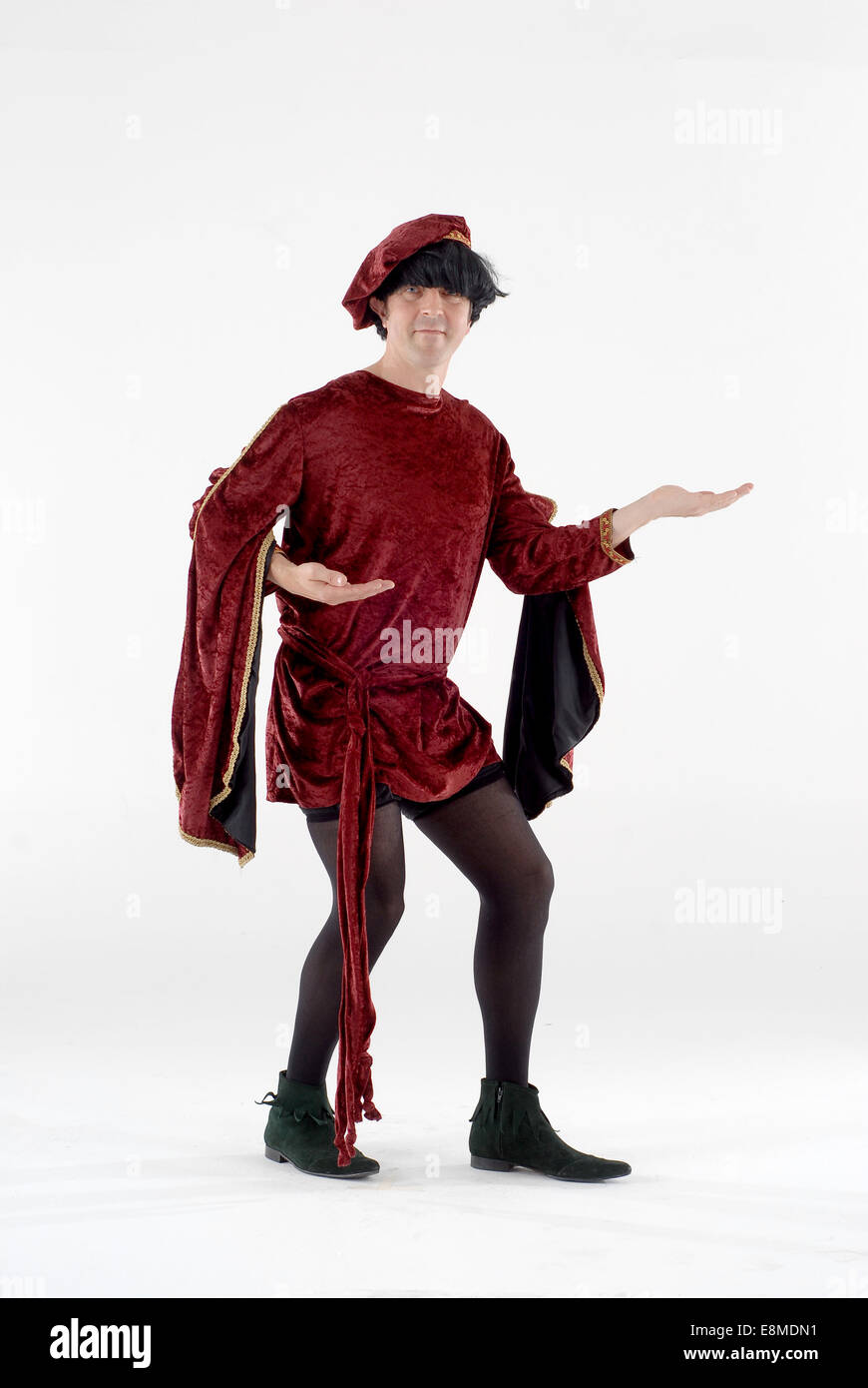 Man dressed in fancy dress comedy costume as a court jester in full ...