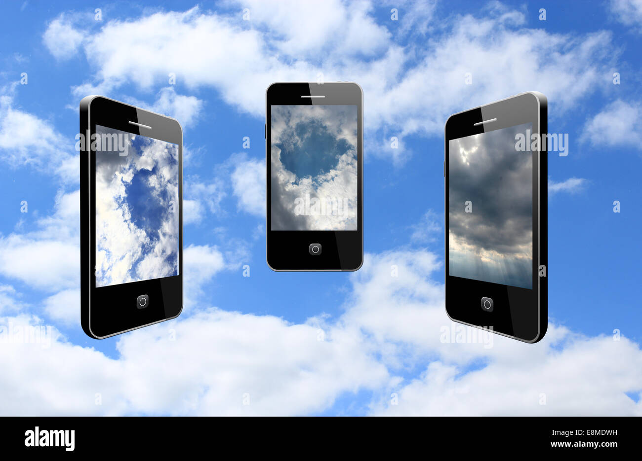 three modern mobile phones on the different cloudy sky Stock Photo - Alamy