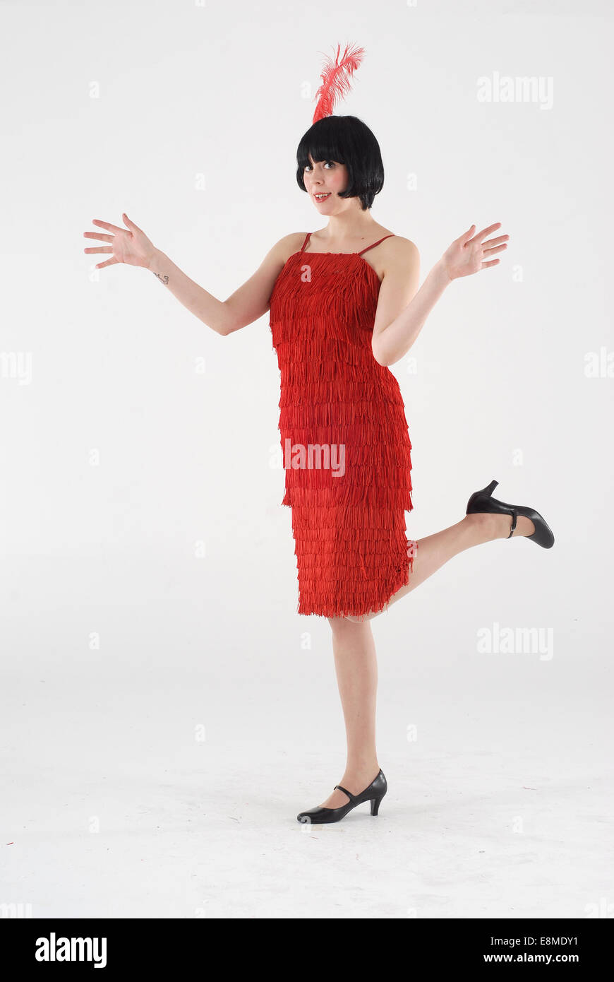 Woman in fancy dress comedy costume in a 1920s flapper fashion outfit ...