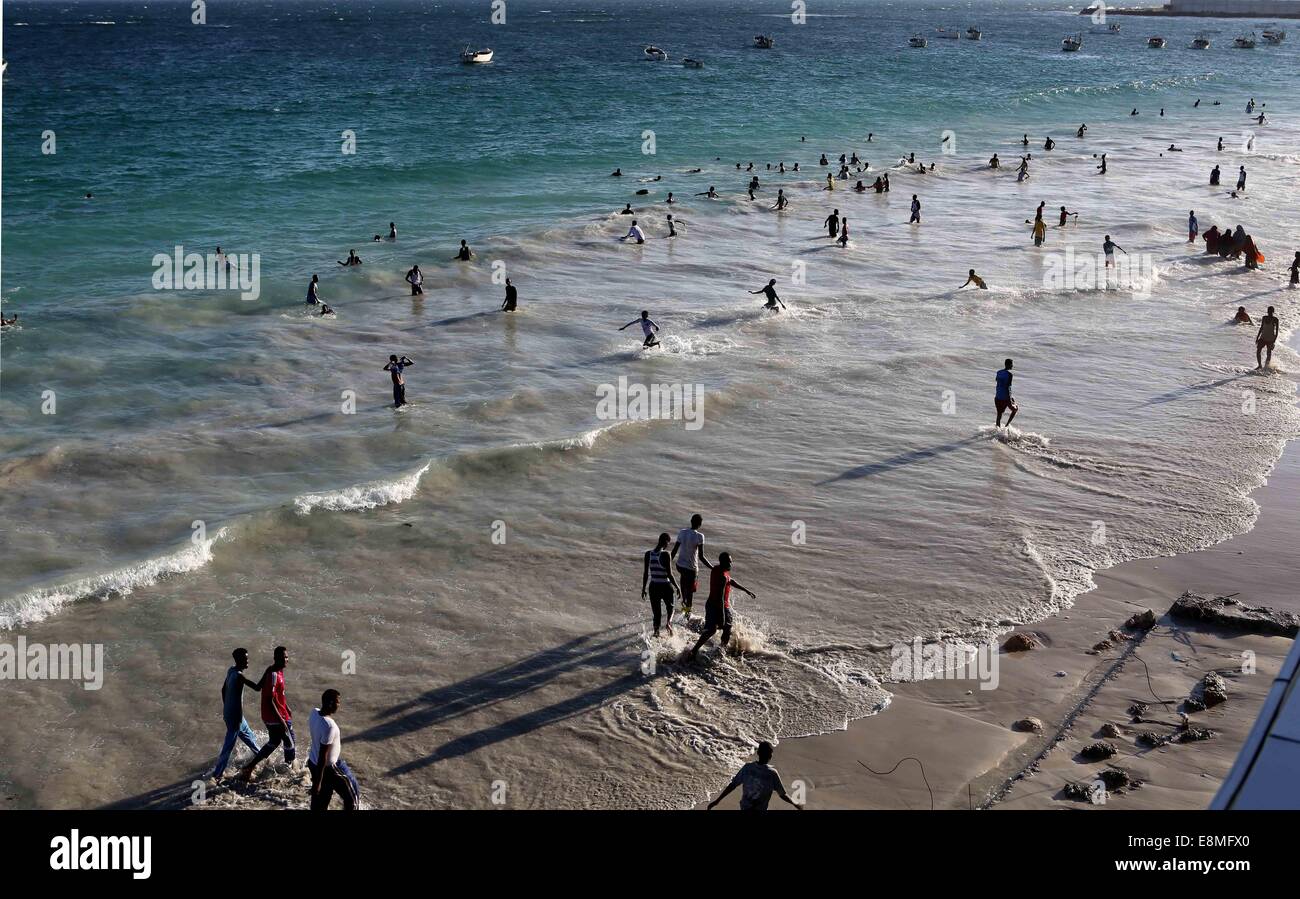 Mogadishu, Somalia. 10th Oct, 2014. Local people have fun on the beach ...
