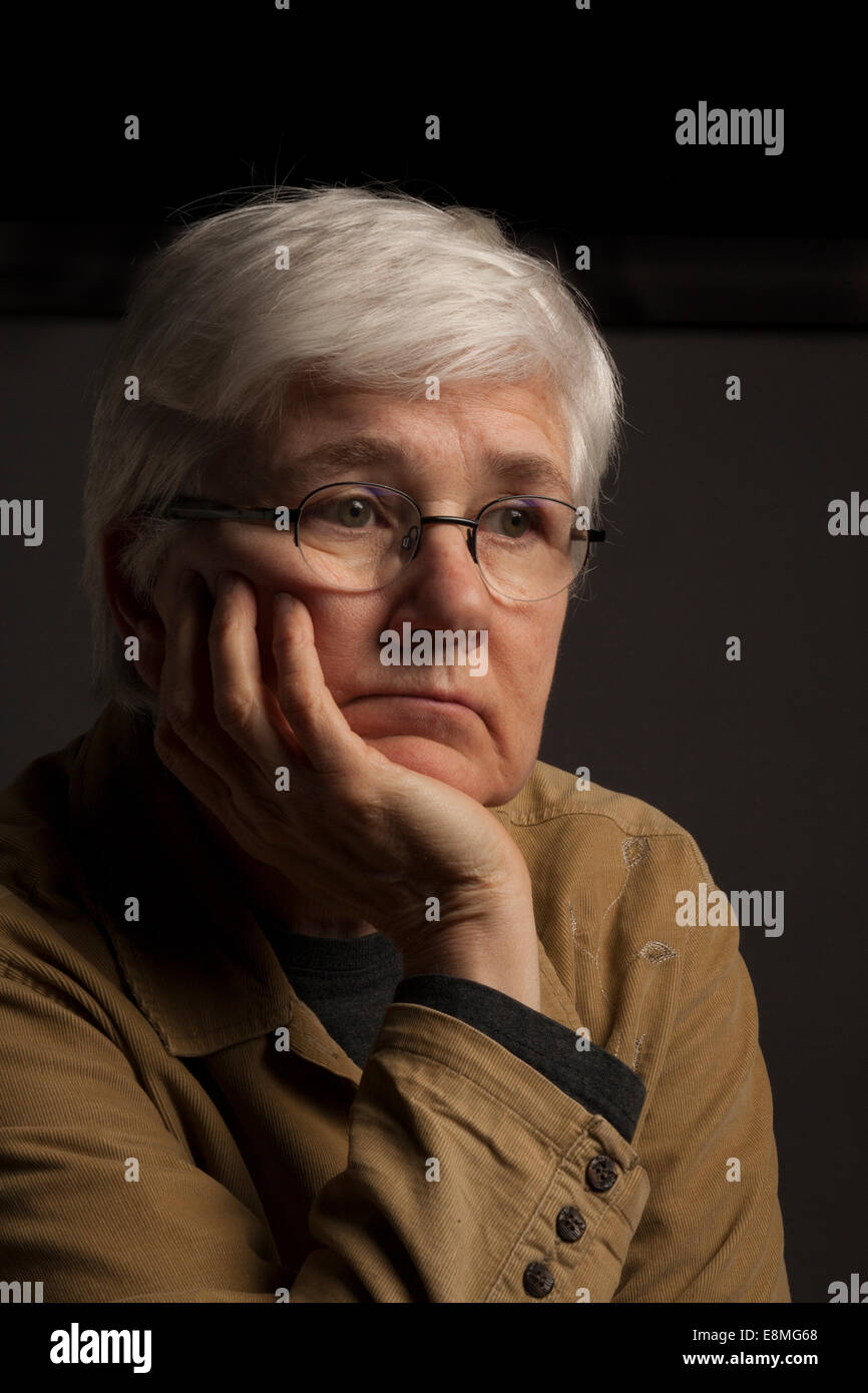 Caucasian woman poses with a sad expression Stock Photo - Alamy