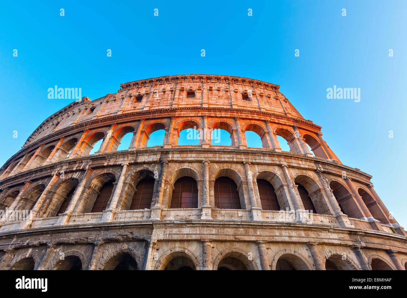 Colosseum at sunset Stock Photo - Alamy