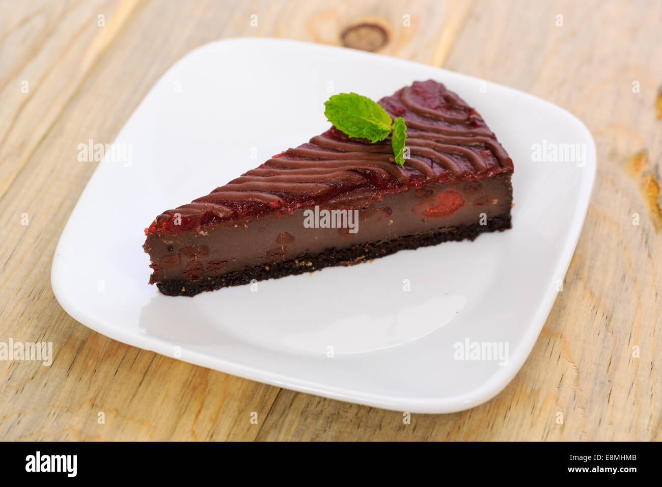A slice of chocolate raspberry cheesecake Stock Photo - Alamy