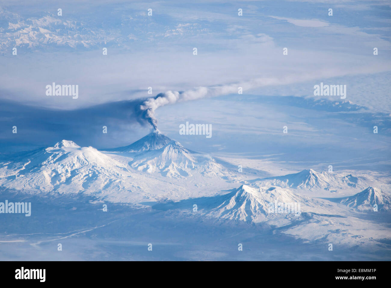 An eruption plume emanating from Kliuchevskoi, one of the many active ...