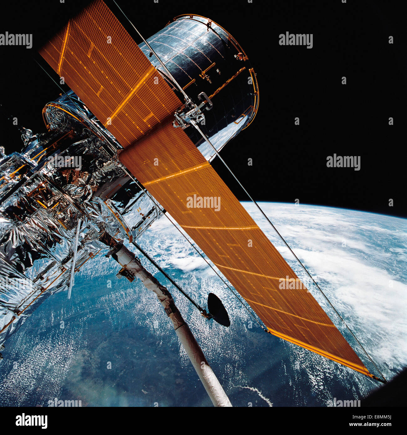 April 25, 1990 - The Hubble Space Telescope backdropped by planet Earth ...