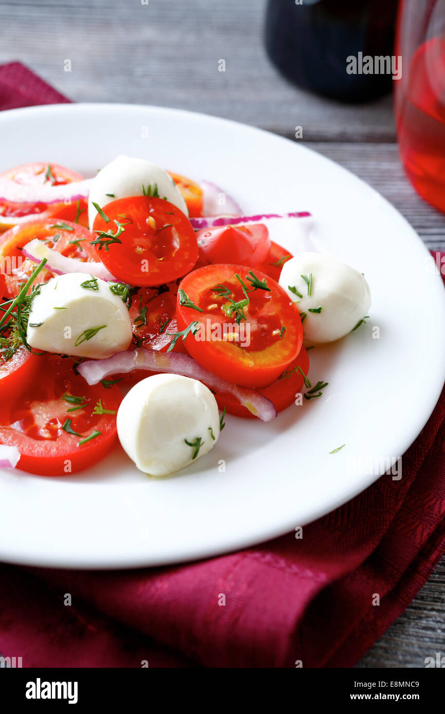 Tasty vegetable salad with mozzarella, close-up Stock Photo - Alamy