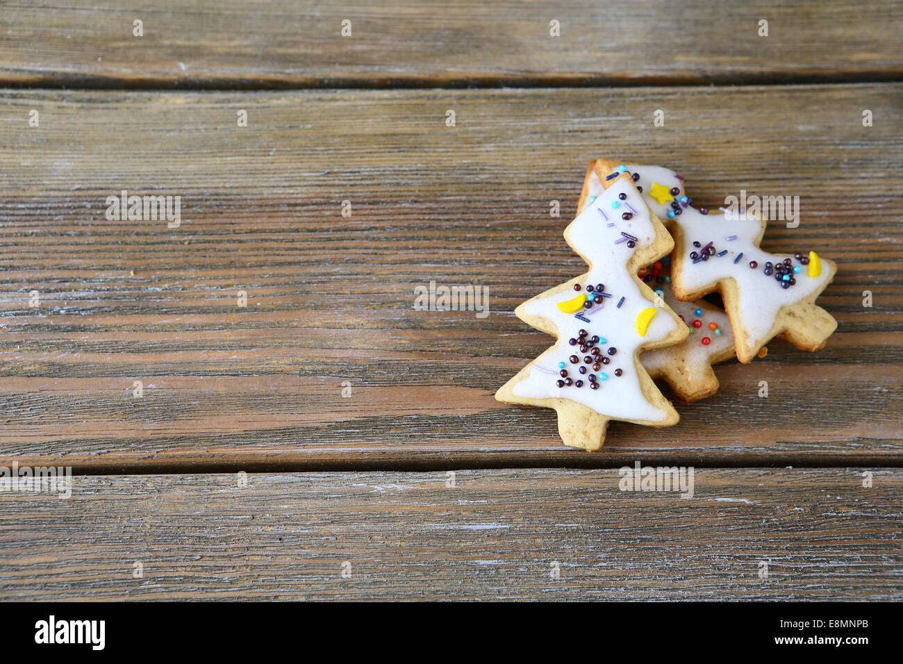 Three cookies in the shape of Christmas trees, sweet holiday food Stock ...