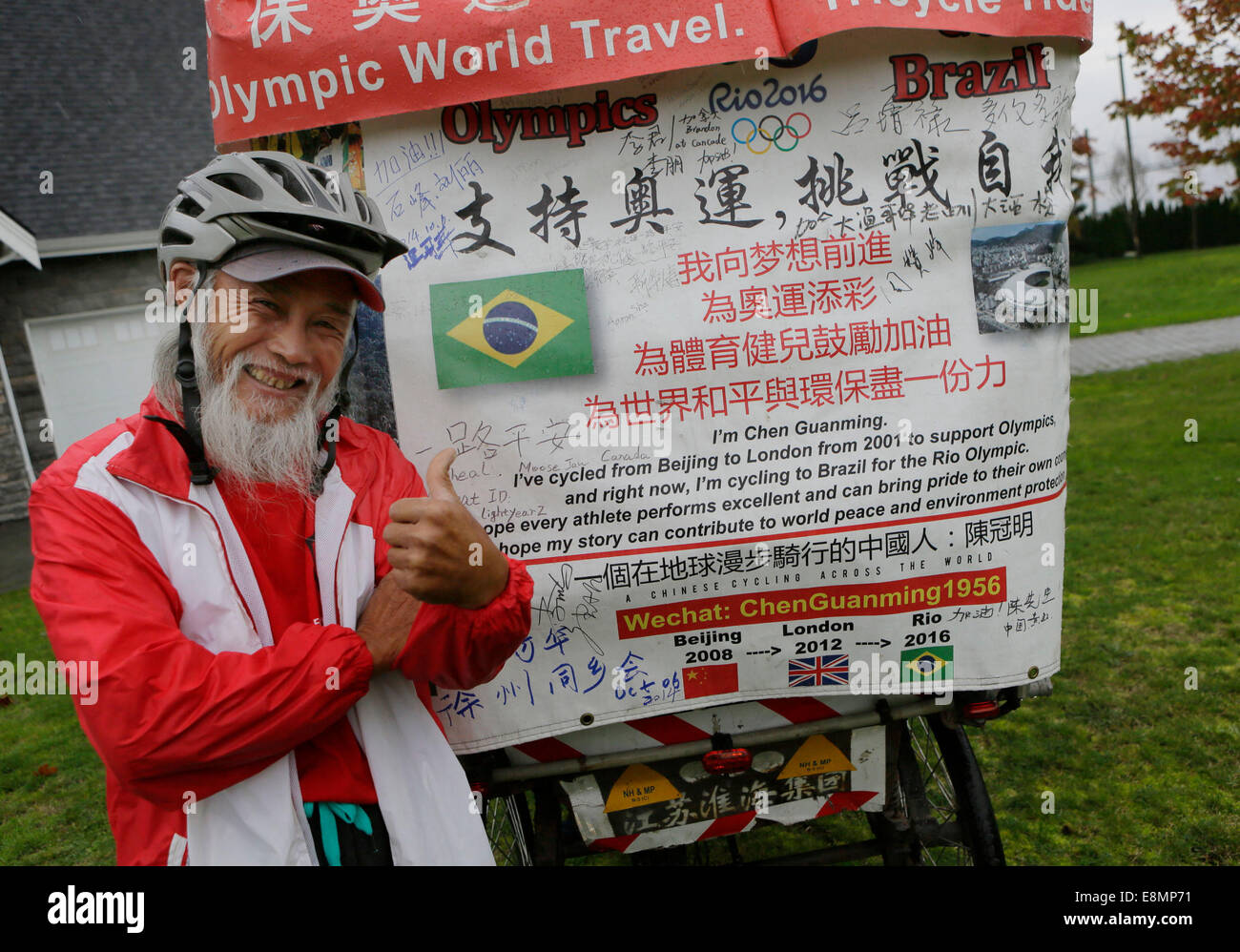 Vancouver, Canada. 10th Oct, 2014. Olympic rickshaw rider Chen Guanming is seen with his ...