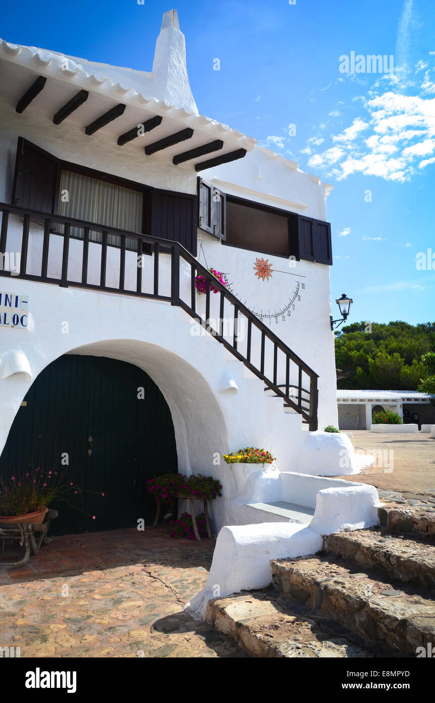 The traditional small white buildings in the town of Binibequer Vell ...