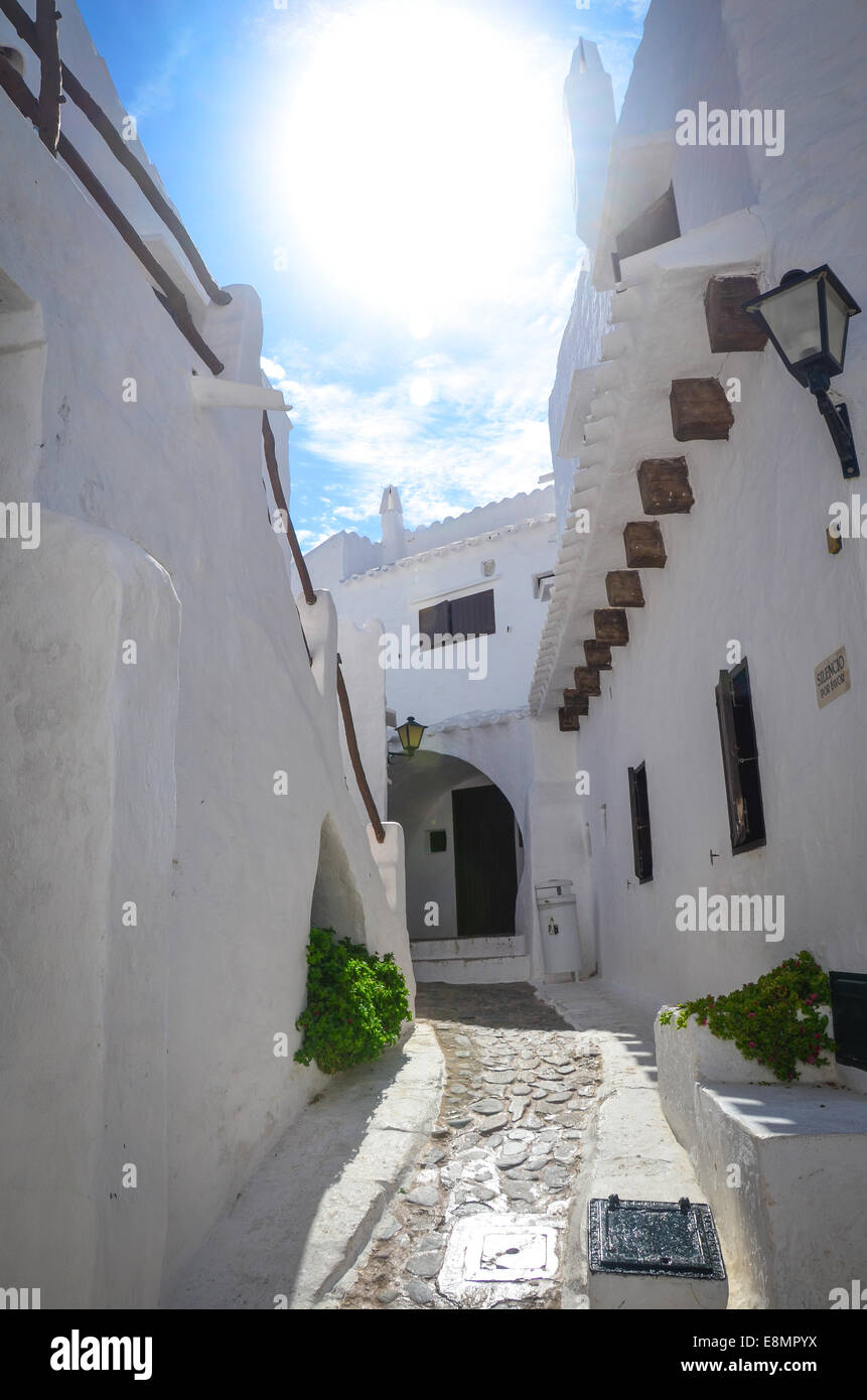 The traditional small white buildings in the town of Binibequer Vell ...