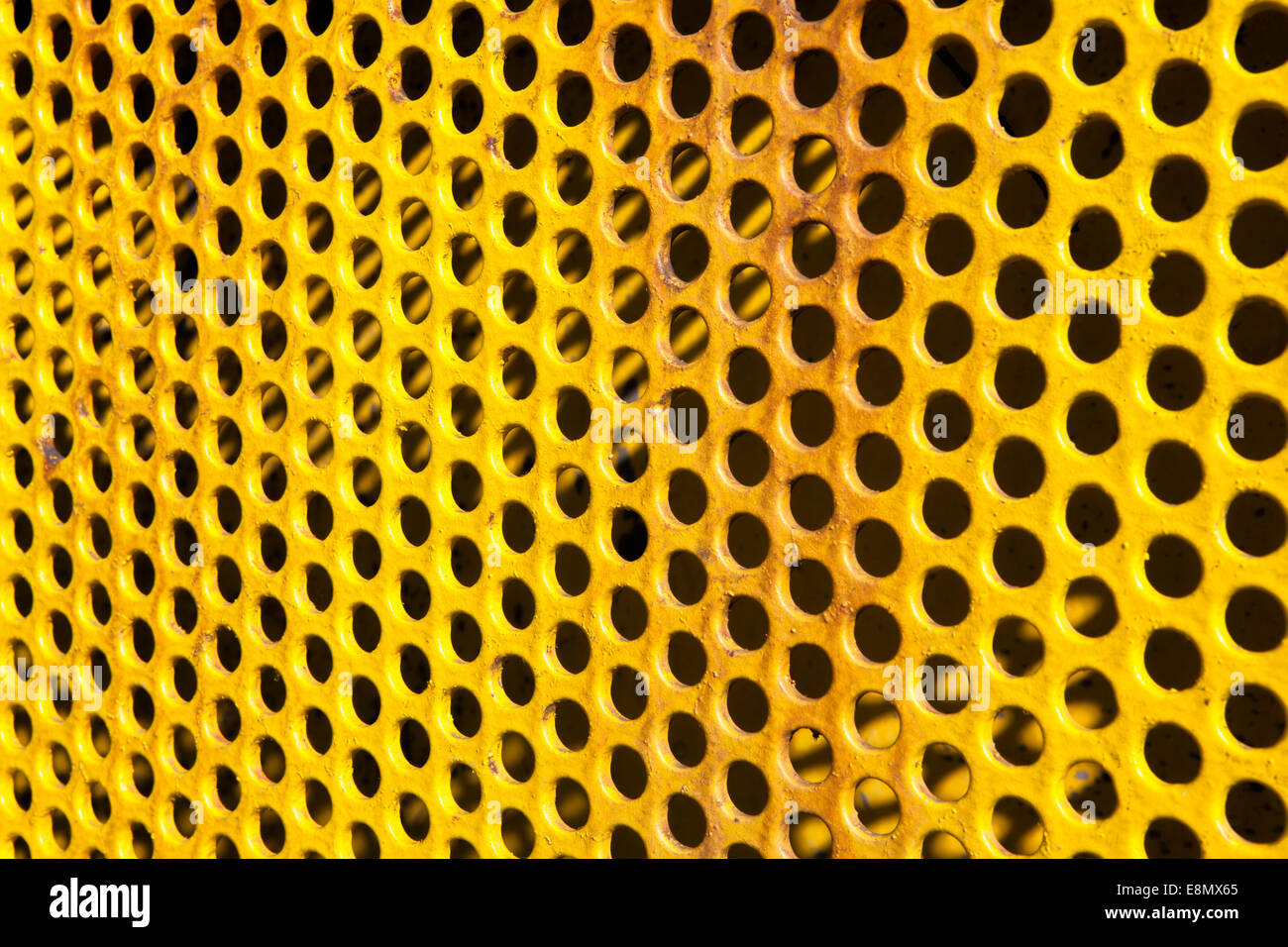 old perforated metal plate Stock Photo - Alamy