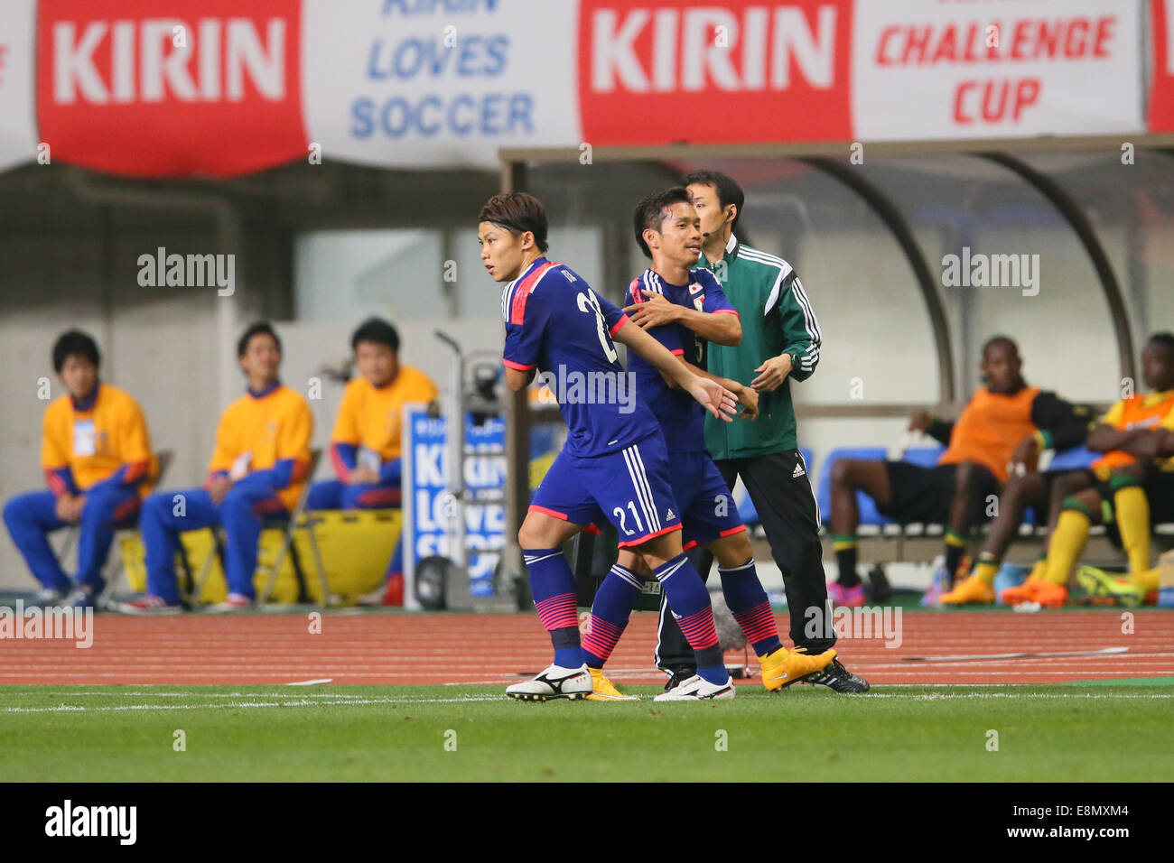 Denka Big Swan Stadium, Niigata, Japan. 10th Oct, 2014. (L to R) Kosuke Ota, Yuto Nagatomo (JPN ...
