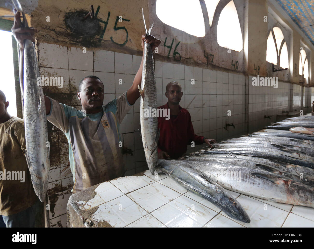 Mogadishu, Somalia. 11th Oct, 2014. Local fishermen sell seafish at a ...