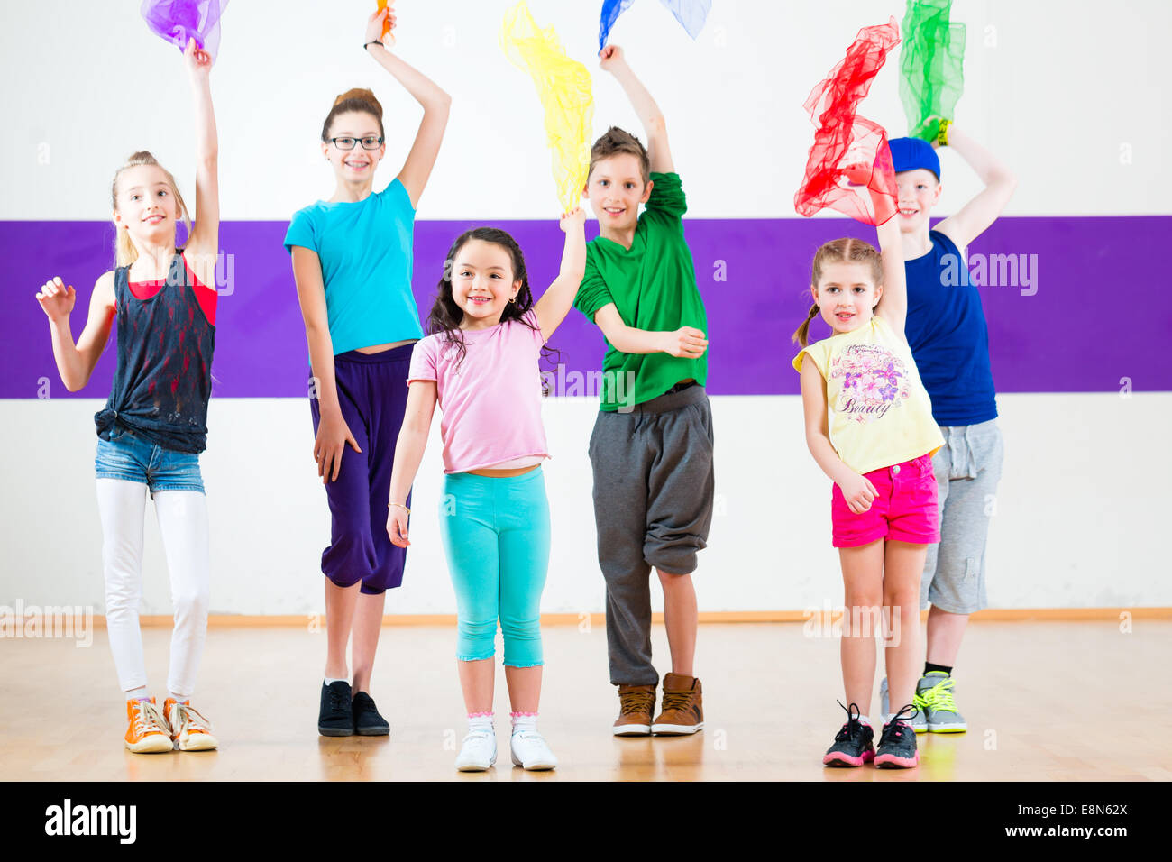 Children dancing modern group choreography with scarfs Stock Photo - Alamy