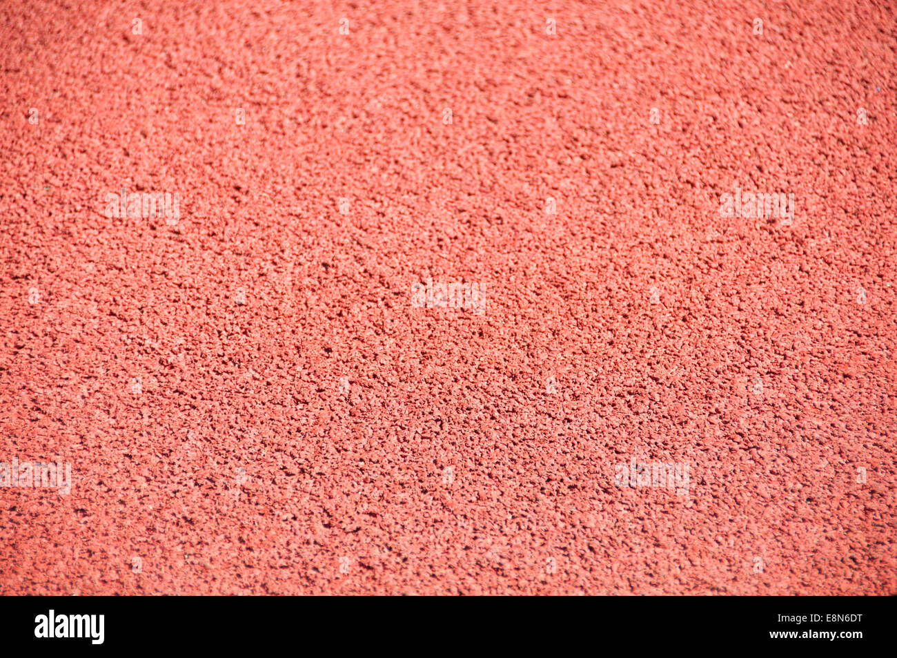 Pink background, asphalt pavement, pattern of small stones Stock Photo ...