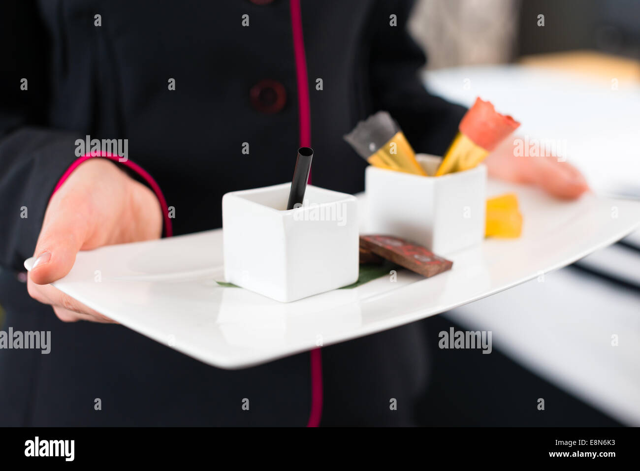 Room service serving sweet VIP dessert in design hotel on room Stock ...