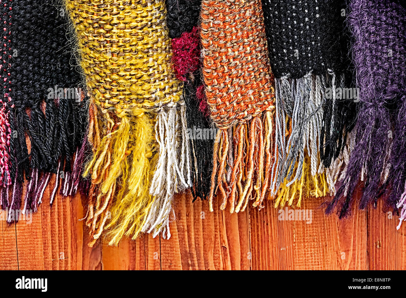 Wool scarves of various colors, exposed for sale Stock Photo - Alamy