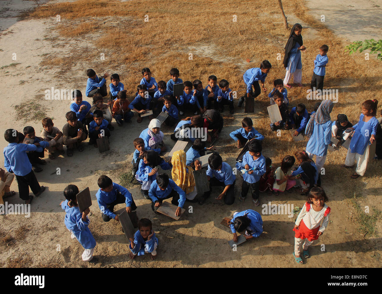 Pakistani children are pursuing their studies even without the modern ...