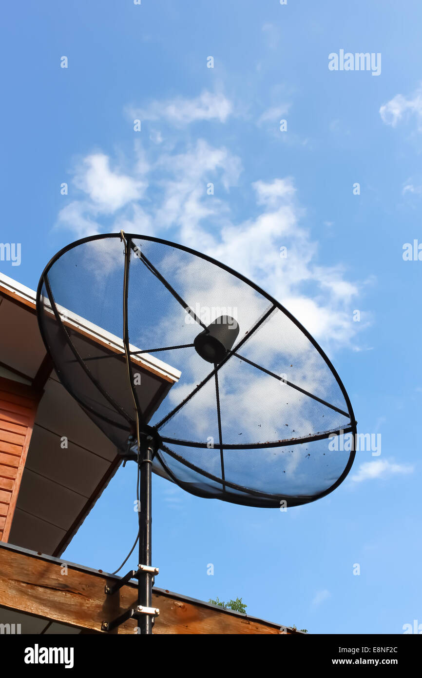 Satellite dish with blue sky Stock Photo - Alamy
