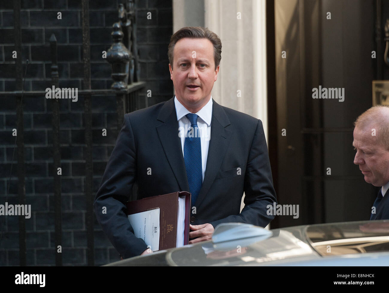 Prime Minister David Cameron leaving 10 Downing Street on his way to ...