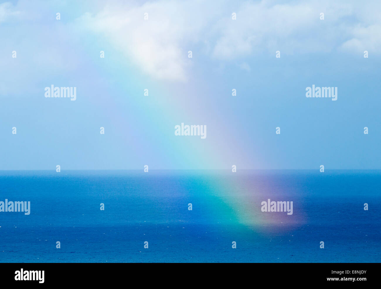Rainbow over the sea Stock Photo - Alamy