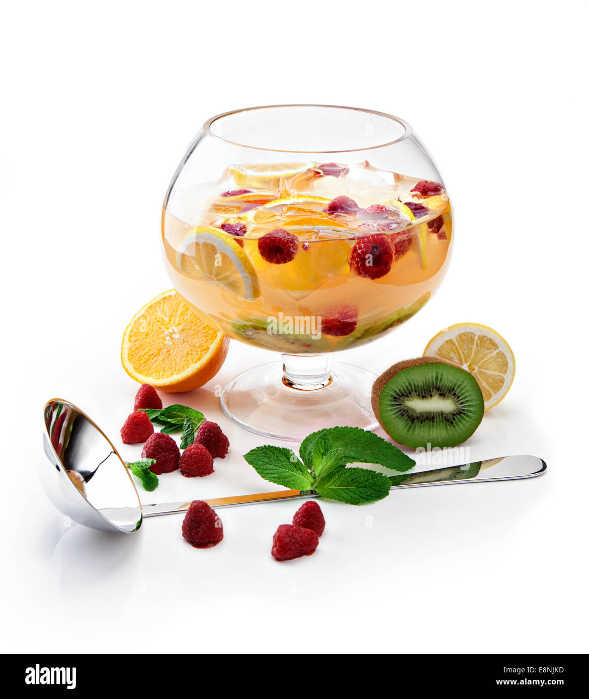 pitcher with a refreshing fruit punch on a white background Stock Photo ...