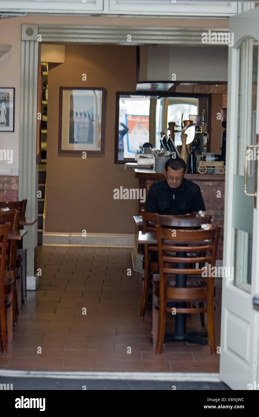Man sat in cafe hi-res stock photography and images - Alamy