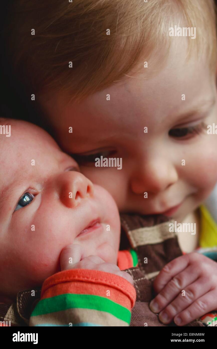 Brothers cuddling hi-res stock photography and images - Alamy