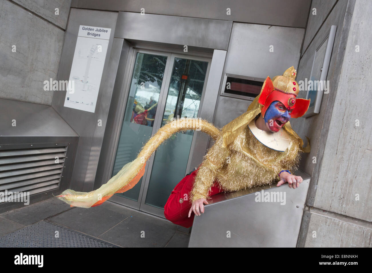 London, England. 12 October 2014. Monkey business with performers from ...