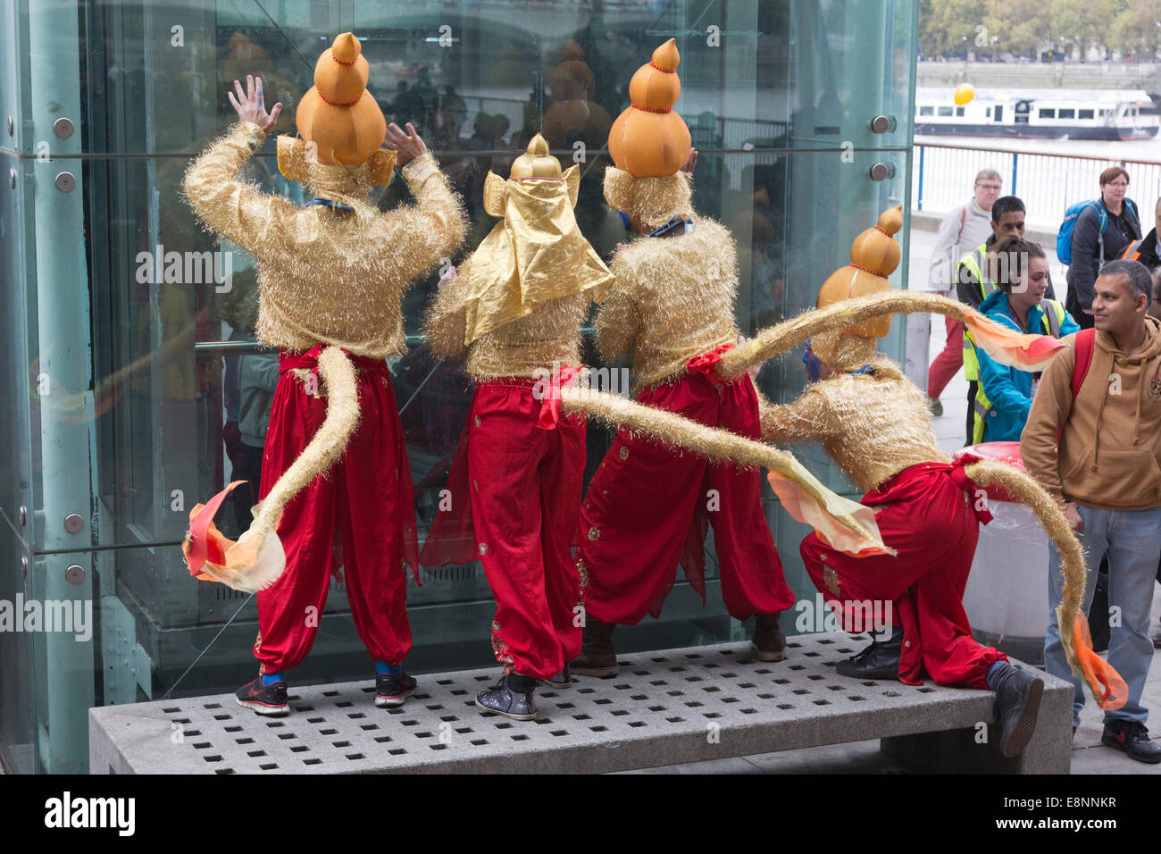 London, England. 12 October 2014. Monkey business with performers from ...