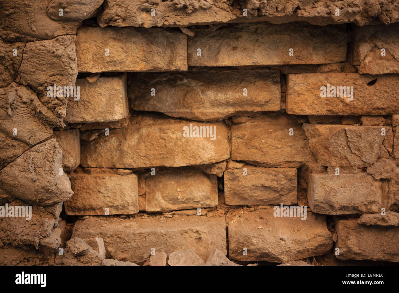 Grungy brickwork with cracks and chipped shot close-up, color tinting ...