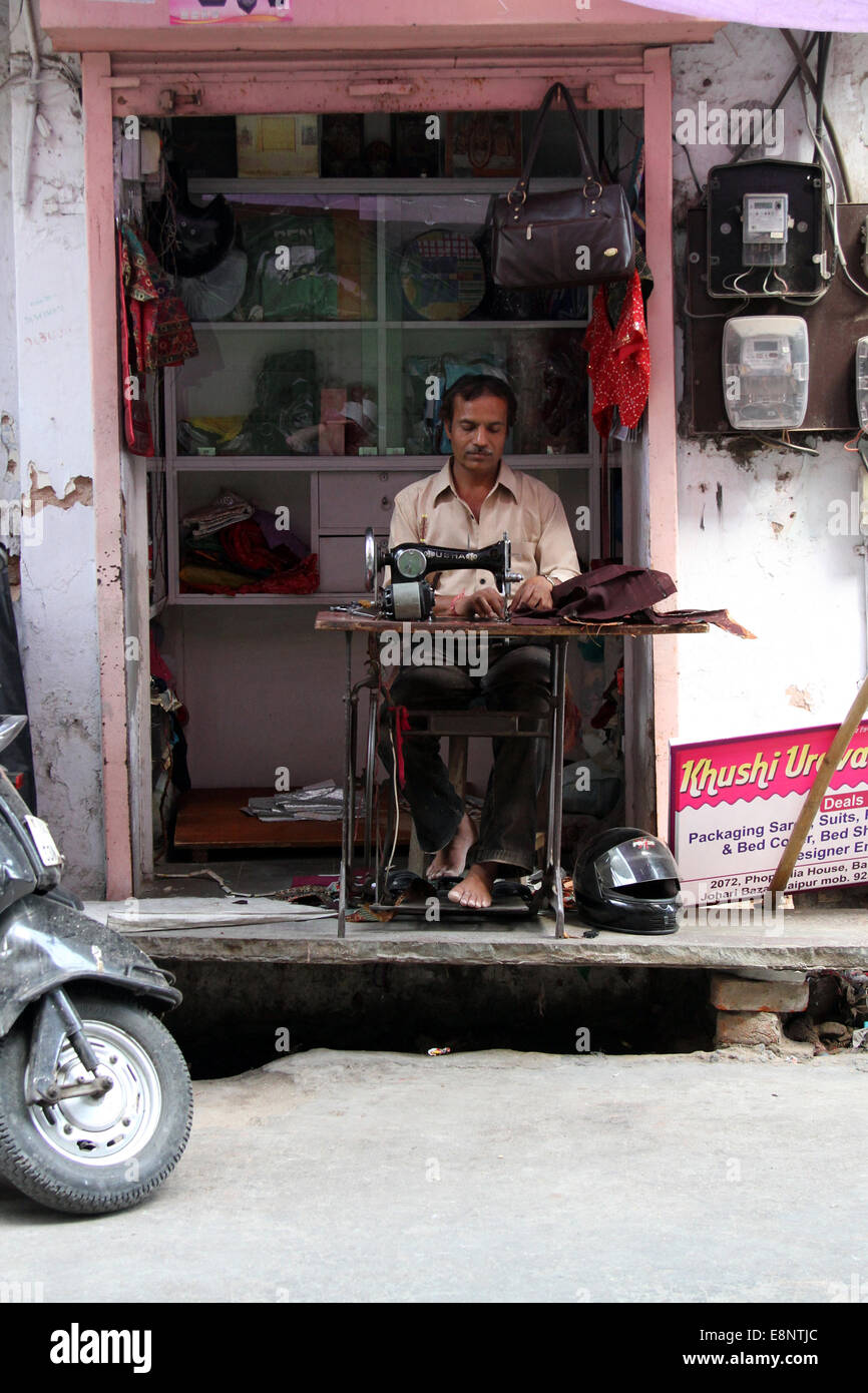 A clothes repair stall in Jaipur, India Stock Photo - Alamy