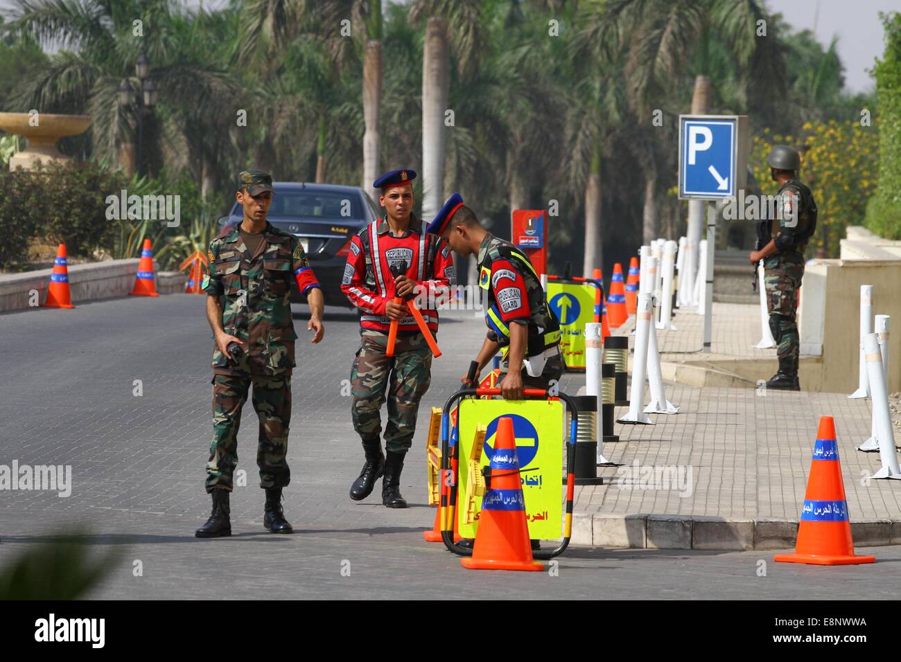 Cairo, Egypt. 12th Oct, 2014. Egyptian security forces stand guard as ...