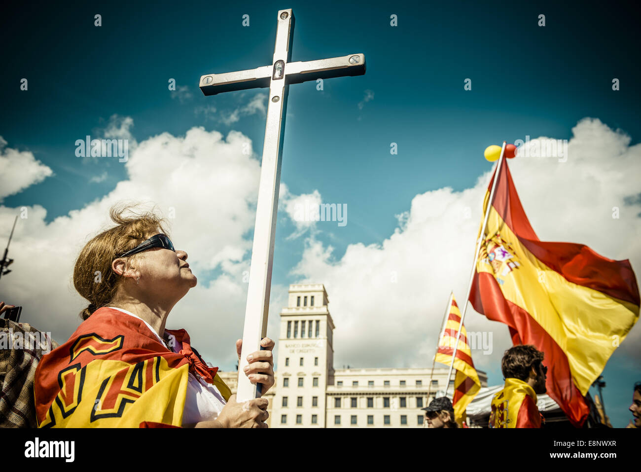 Barcelona, Spain. 12th Oct, 2014. A demonstrator wrapped in the Spanish ...