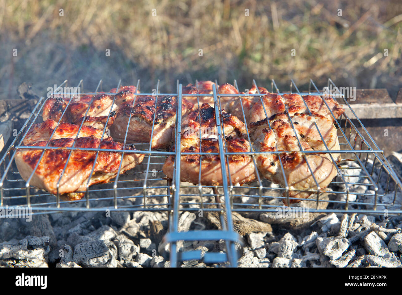 Being grilled hi-res stock photography and images - Alamy