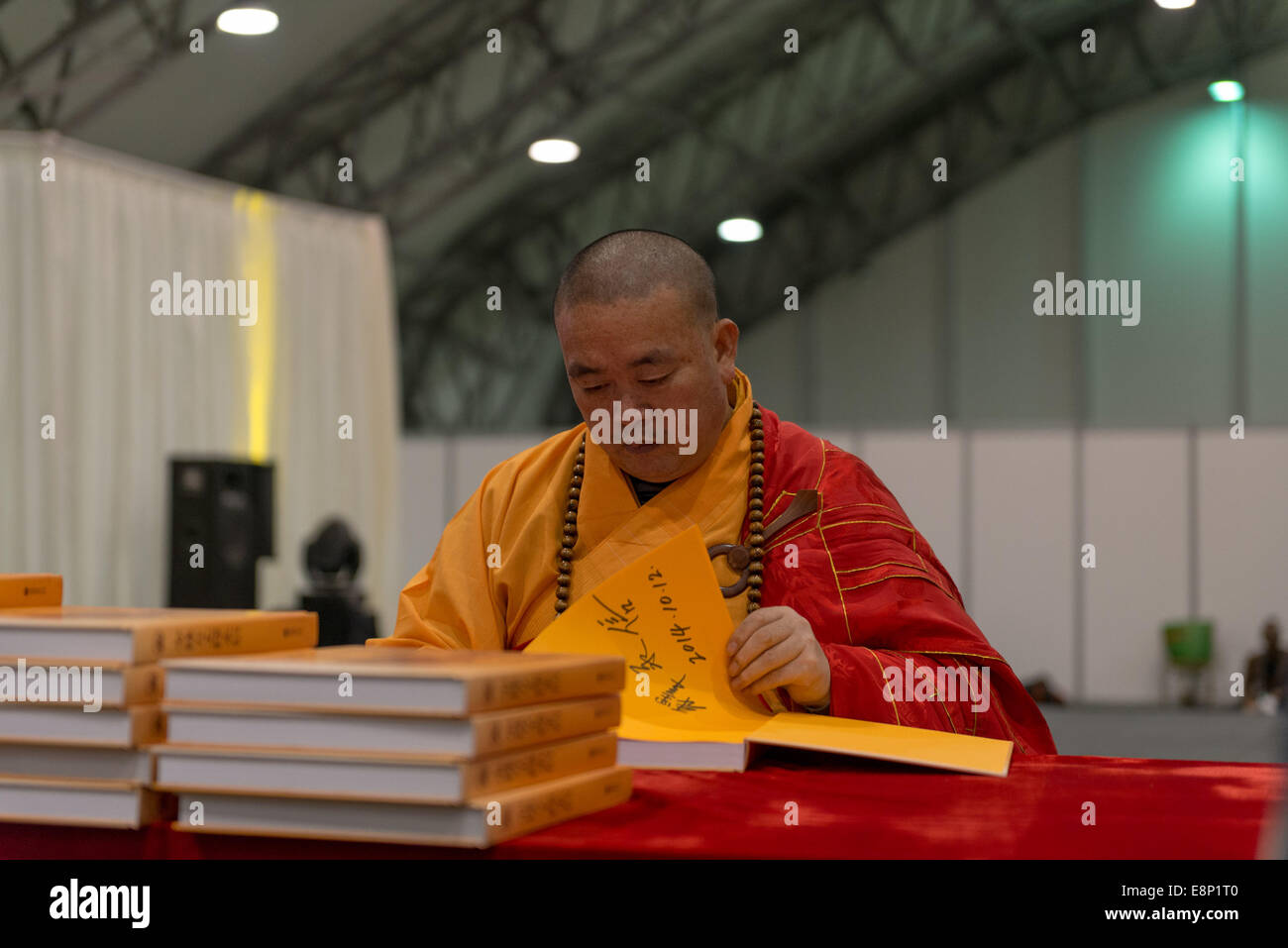 The Abbot of Shaolin Temple Shi Yongxin signing his book in London ...