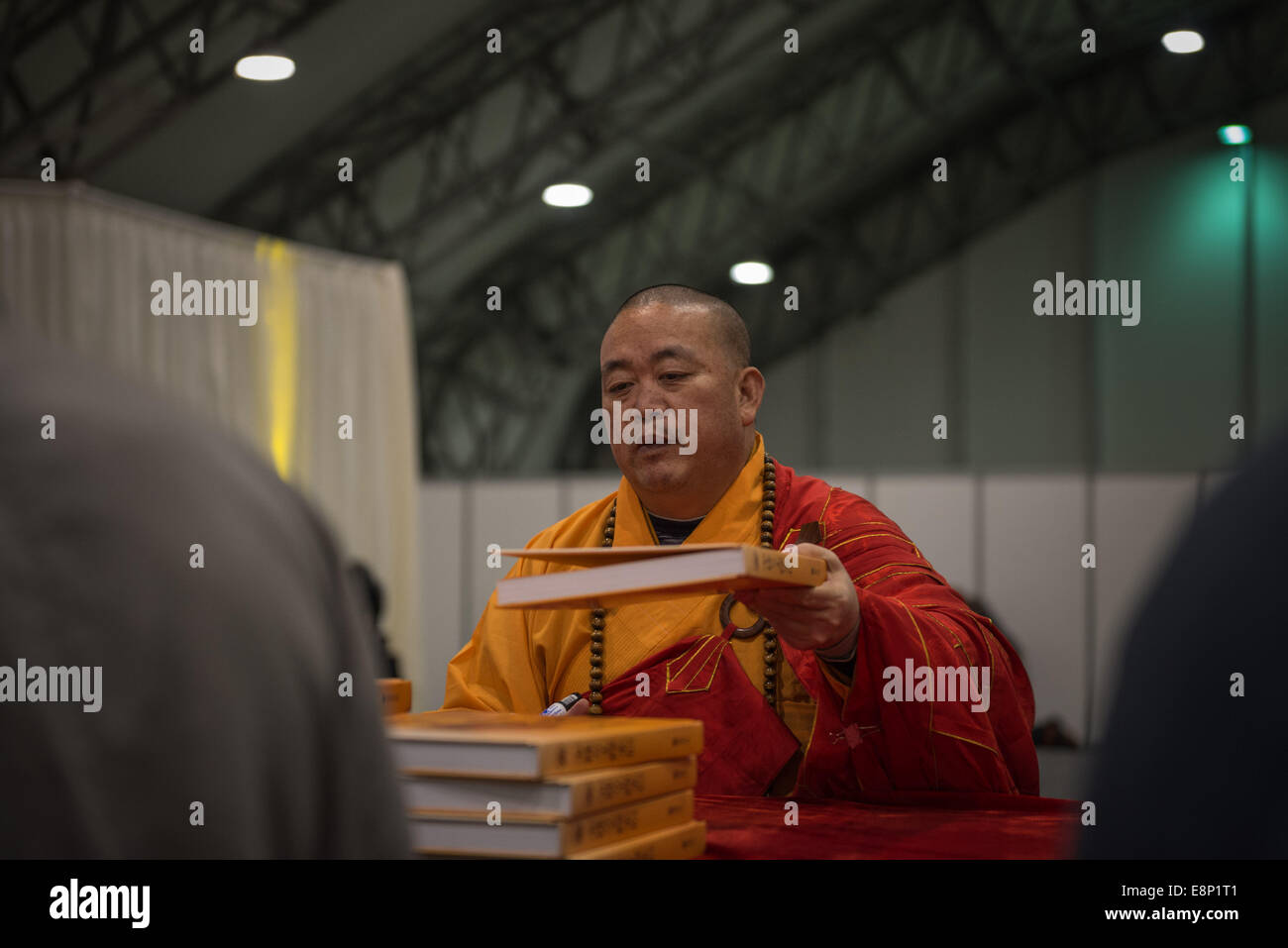 The Abbot of Shaolin Temple Shi Yongxin signing his book in London ...
