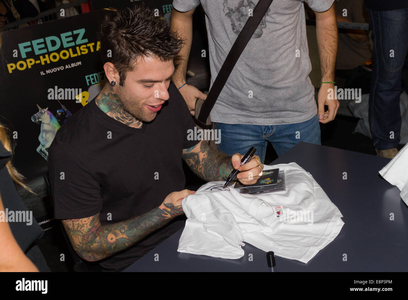 Turin, Italy. 12th October, 2014. The Italian rapper Fedez, meet his ...